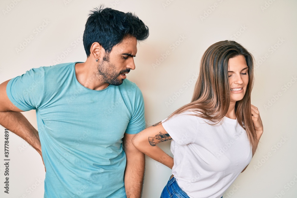 Beautiful young couple of boyfriend and girlfriend together suffering ...