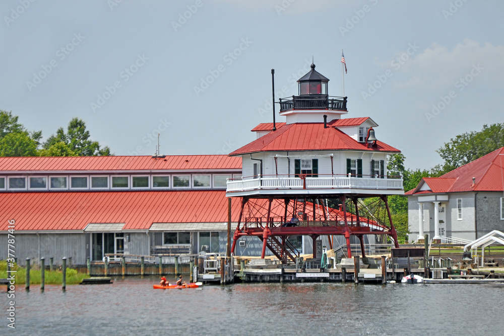 The Drum Point lighthouse stands out on the Solomon Island waterfront ...