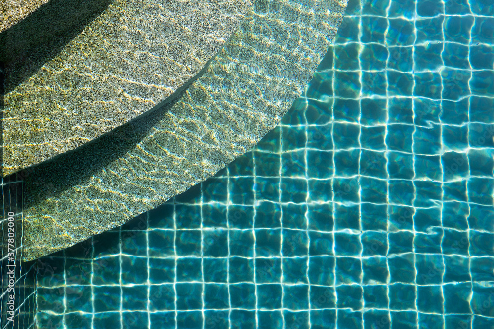 Green mosaic tile pool floor with stairs and light ripples Stock Photo ...