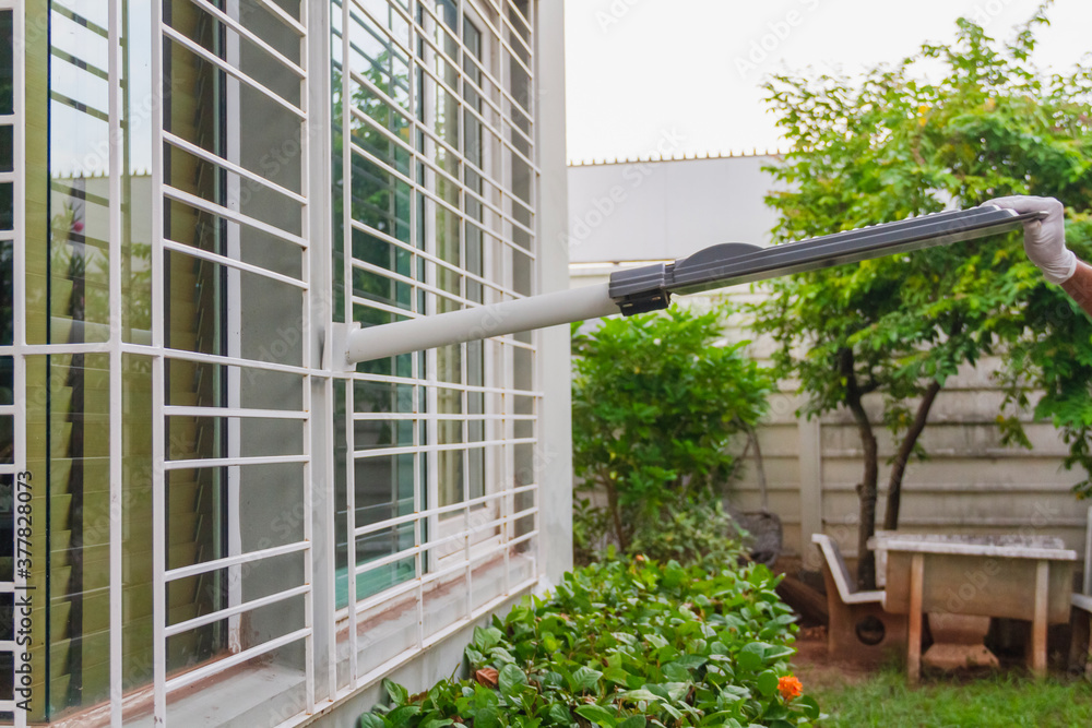 human install solar cell light with window outside of home for saving ...