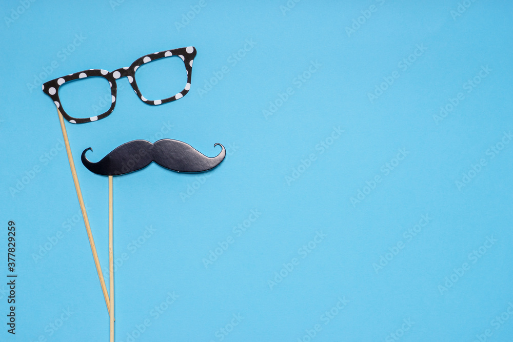 Photo booth props moustache and glasses on blue background. Greeting ...