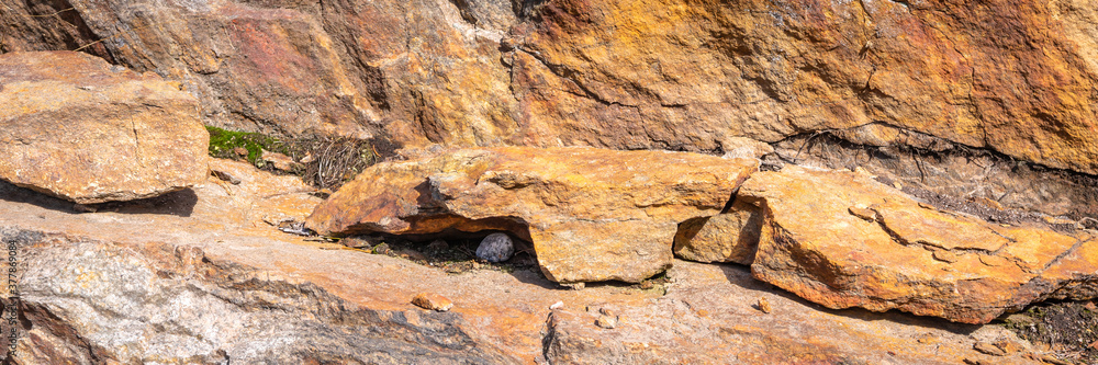 Rusted granite texture. Rusted stone background. Granite rocks ...