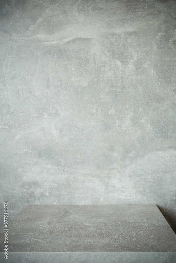 wooden table and grey wall background Stock Photo | Adobe Stock