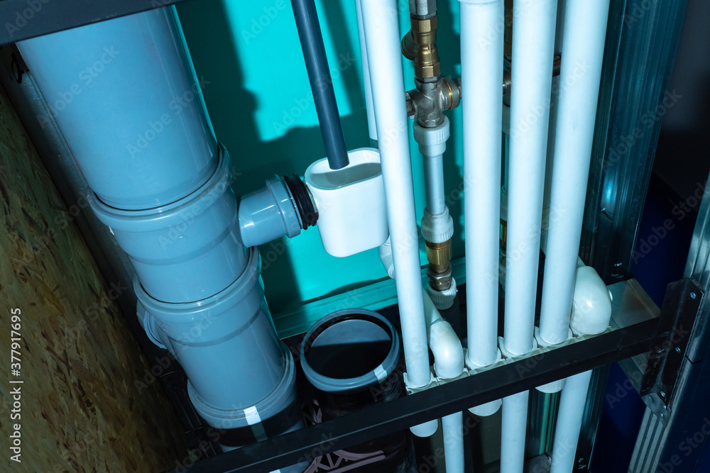 Water supply and Sewerage. Pipe system in the apartment. Water and ...