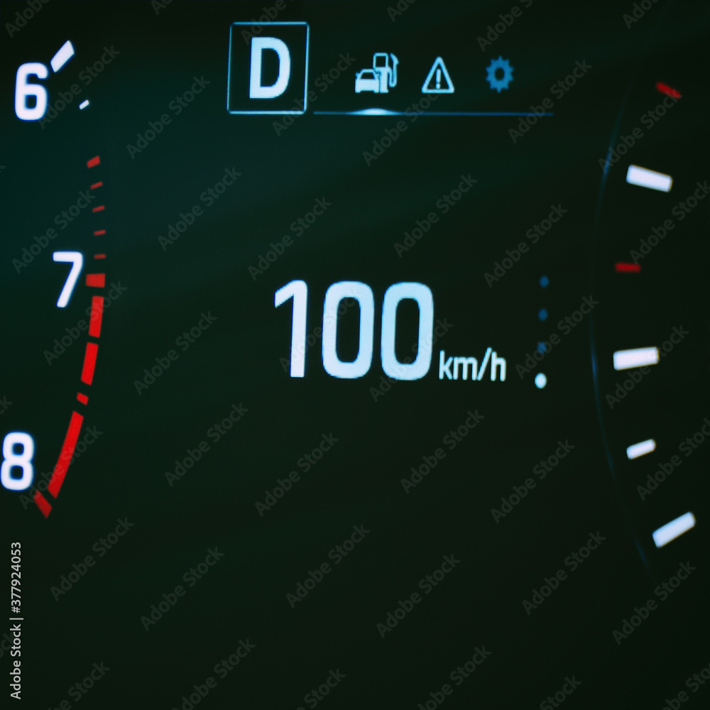 Speedometer in the car on the dashboard. The car's speedometer shows ...