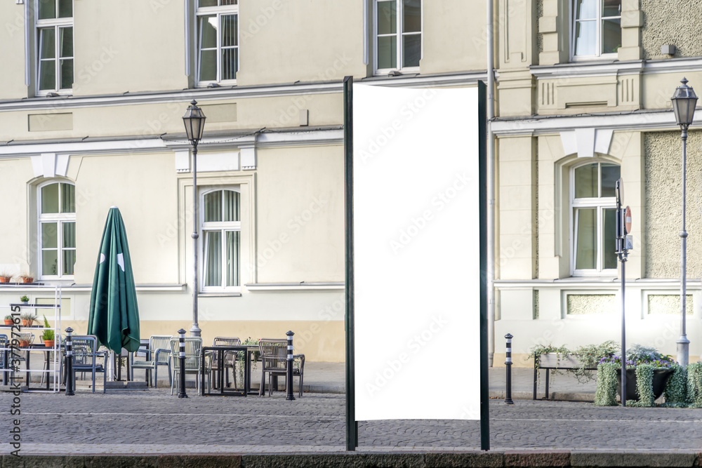 Mockup of blank white city outdoor advertising vertical billboard stand ...