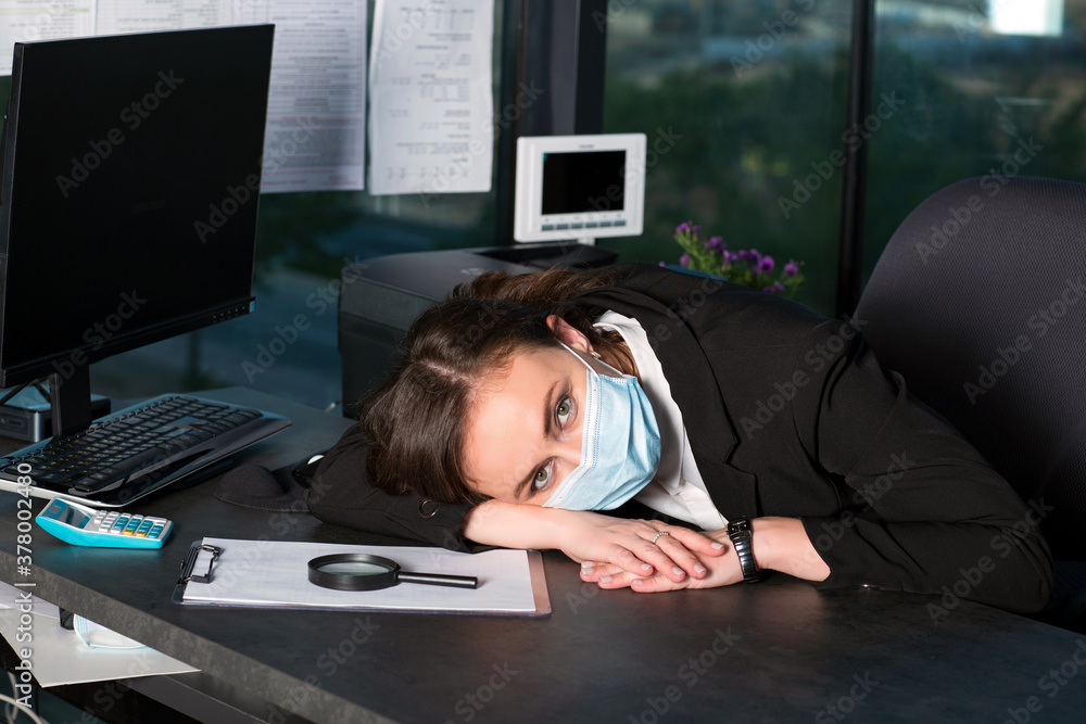 Blur photo of female employee wearing hygiene protective mask working ...