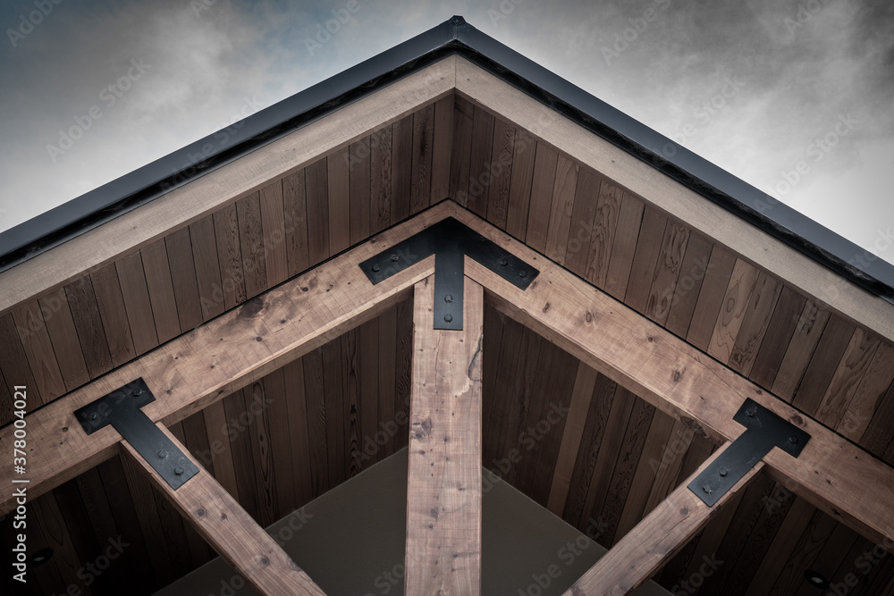 Roof apex with large wooden beams Stock Photo | Adobe Stock
