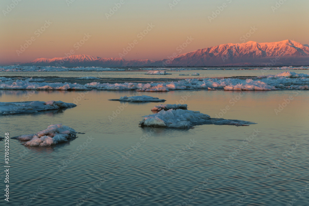 Rare frozen saltwater at the Great Salt Lake in Northern Utah. Wasatch ...