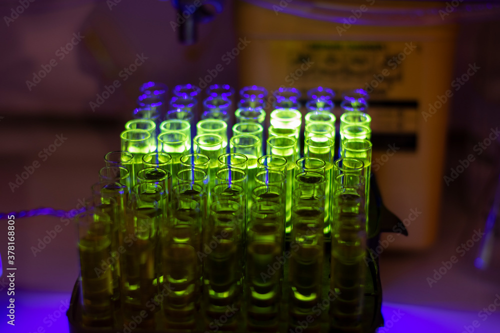 Glowing fluorescent compound collected from column chromatography in ...