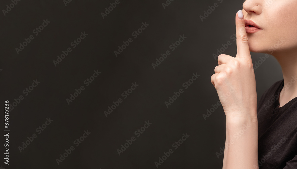 Hush gesture. Social campaign. Woman showing shhh with finger on lips ...
