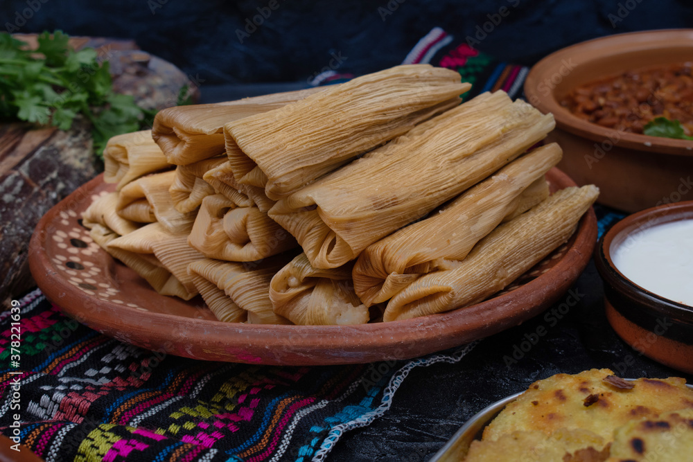 Vegan tamales filled with seitan, masa, chile verde and served with ...
