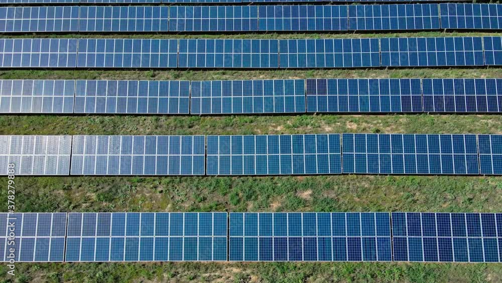 Aerial top down view Solar panel farm seen from above, filmed by drone ...