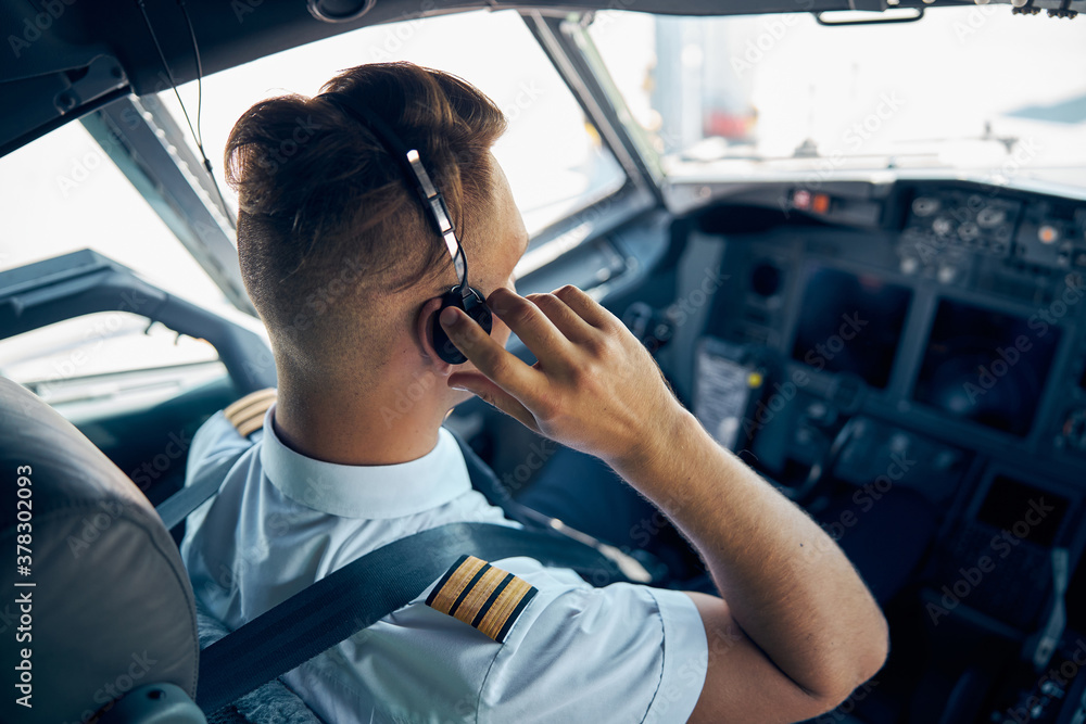 Poster Two pilot get ready for a flight in aircraft – Wall Art | UkPosters
