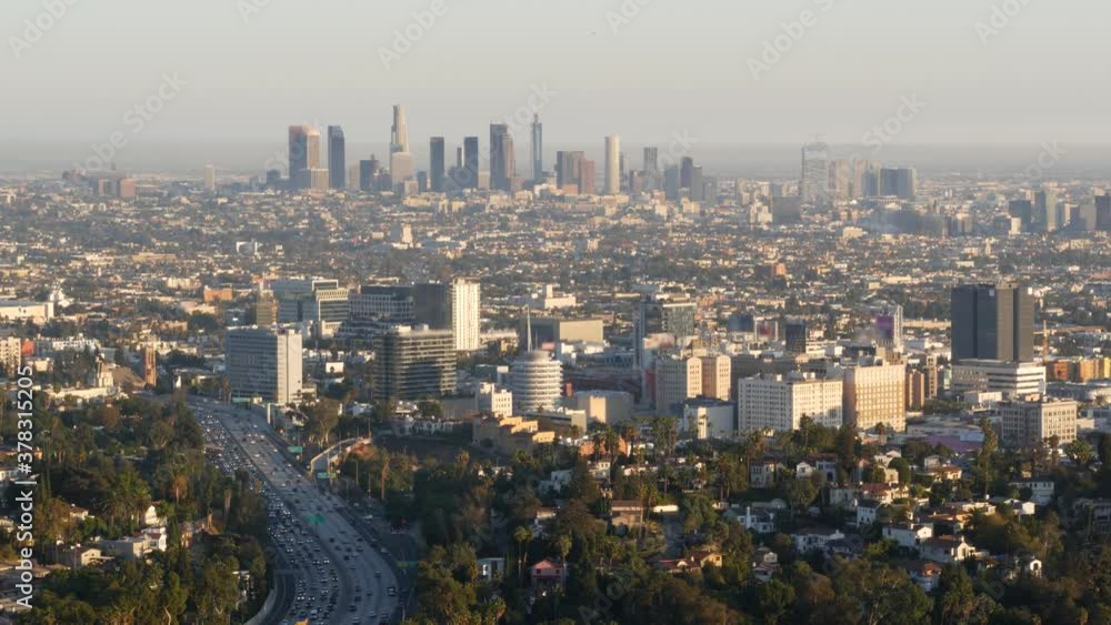 Highrise skyscrapers of metropolis and busy rush hour highway, Los ...