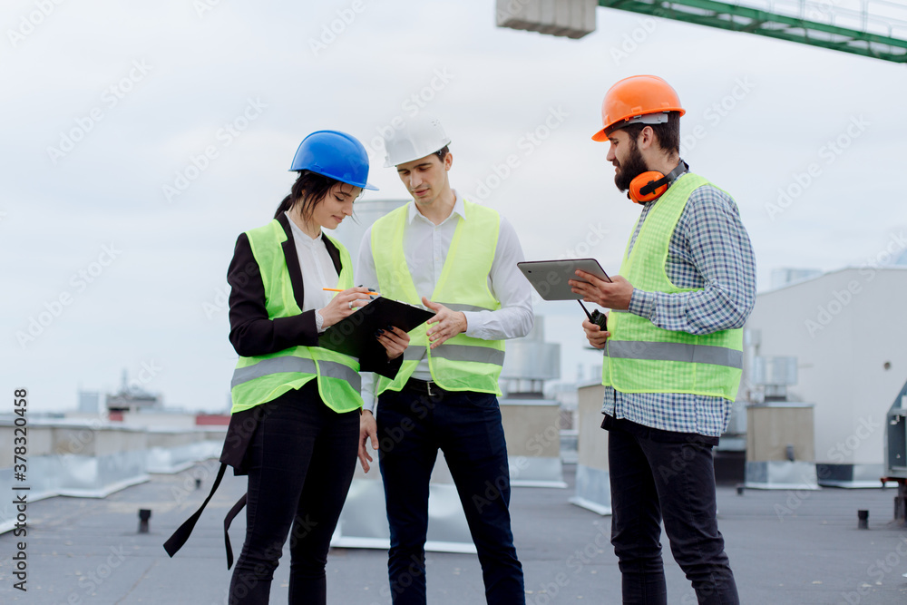 Good looking multiethnic group of workers in a modern building ...