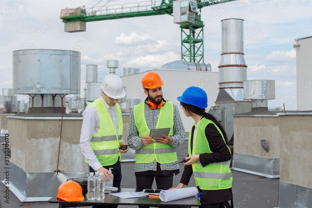 Good looking multiethnic group of workers in a modern building ...