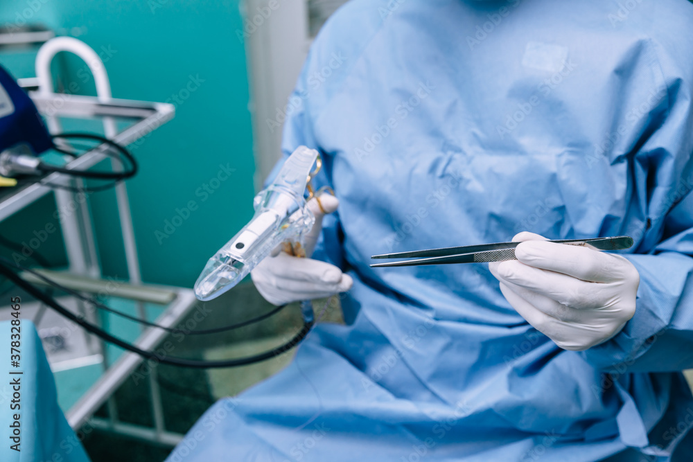 Surgical instruments for operation with a hand in a surgical glove with ...