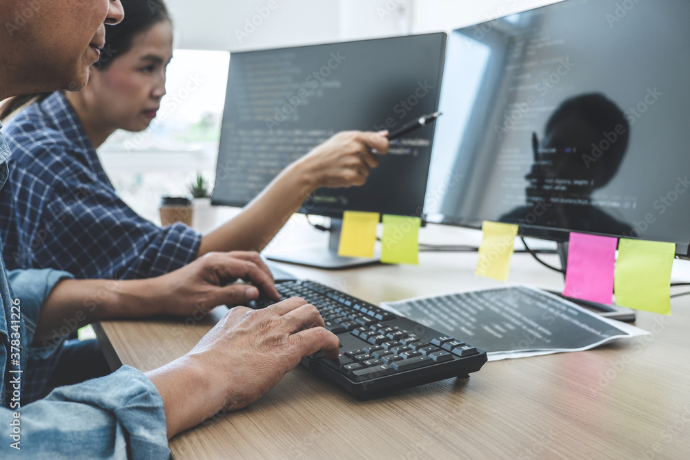 Writing Codes And Typing Data Code Technology Two Professional Programmer Cooperating Working