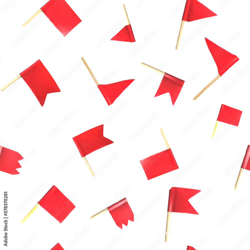 Seamless pattern with many small red flags on wooden skewers or ...