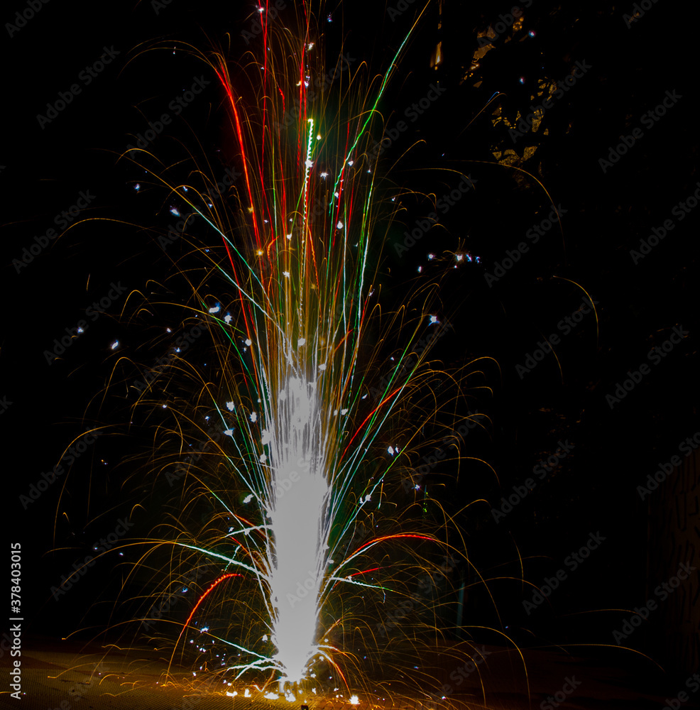 colurful tubri anar firework during diwali festival durga kali puja ...