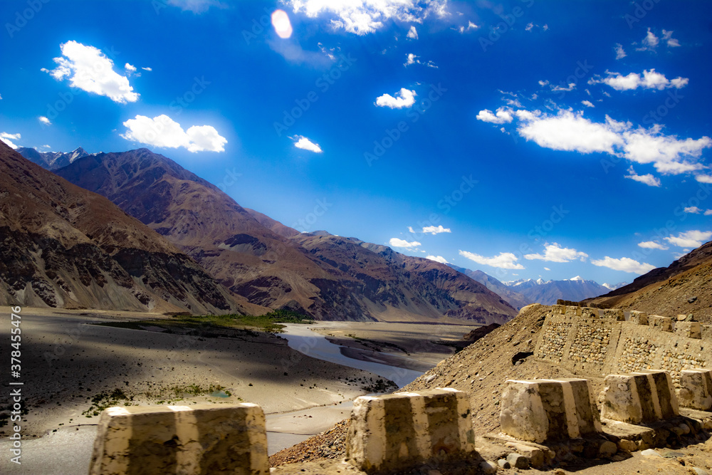 shades of cloud in High dynamic range image of barren mountain in a ...