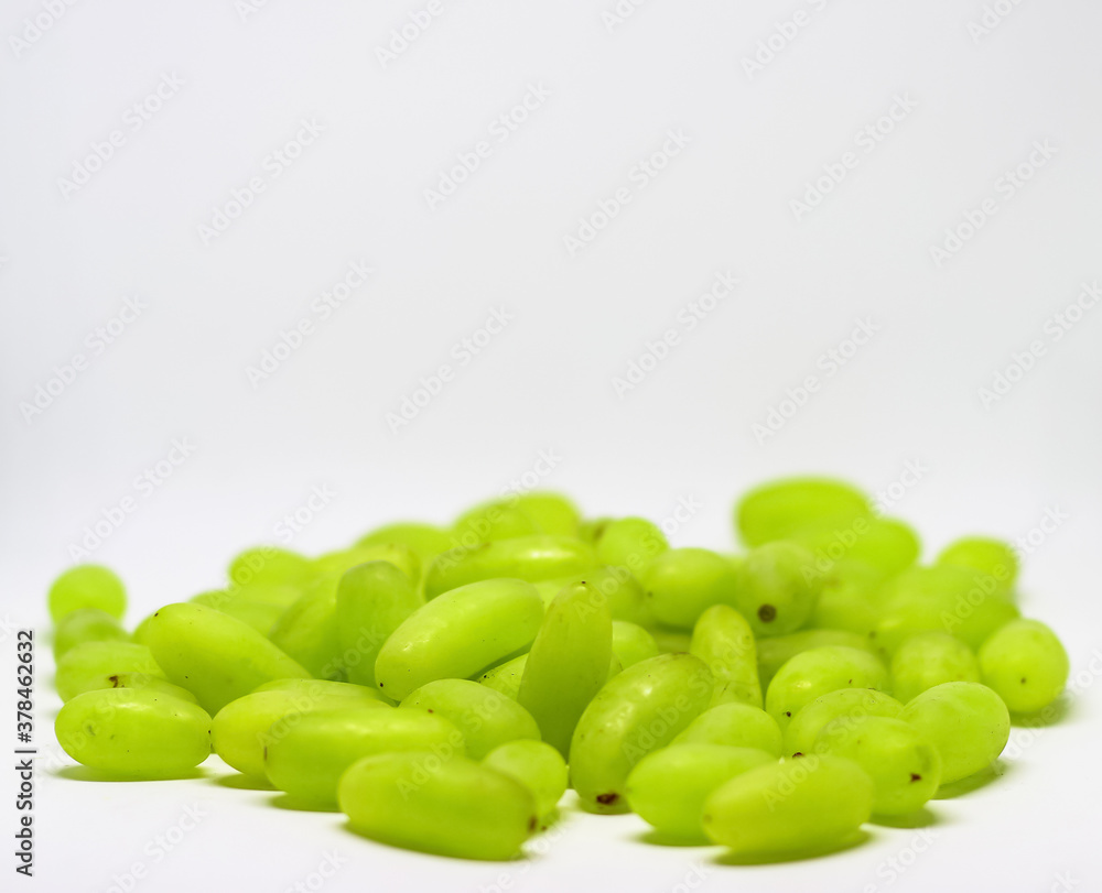 Green grape without branches and leaves isolated on white. With ...