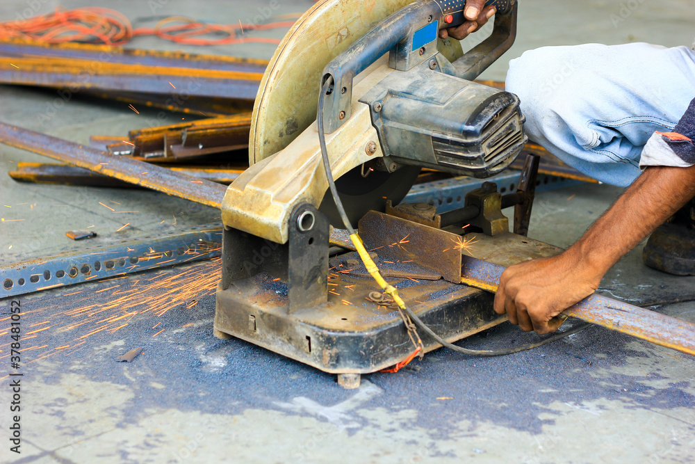 cutting of iron steel TMT bars with motorised steel cutter and ...