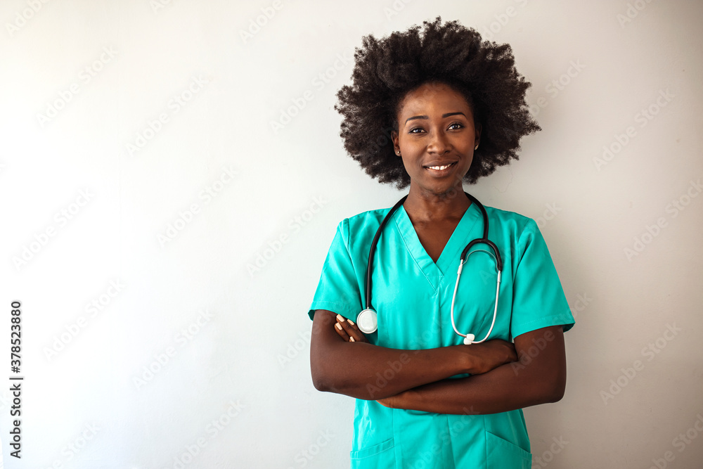 Portrait of a nurse standing in a hospital. Female nurse looking ...