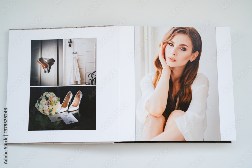 open wedding photo book. flipping through a photobook with thick pages ...