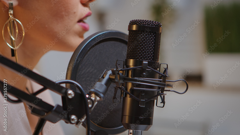 Recording audio at home using professional microphone. Creative online ...