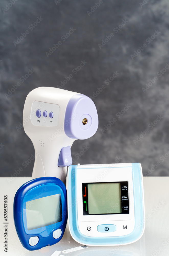 Remote thermometer, blood glucose meter and wrist blood pressure ...