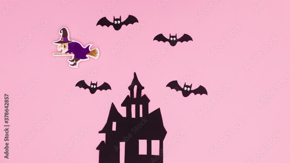 Looping Halloween stop motion animation with witch flying above the ...