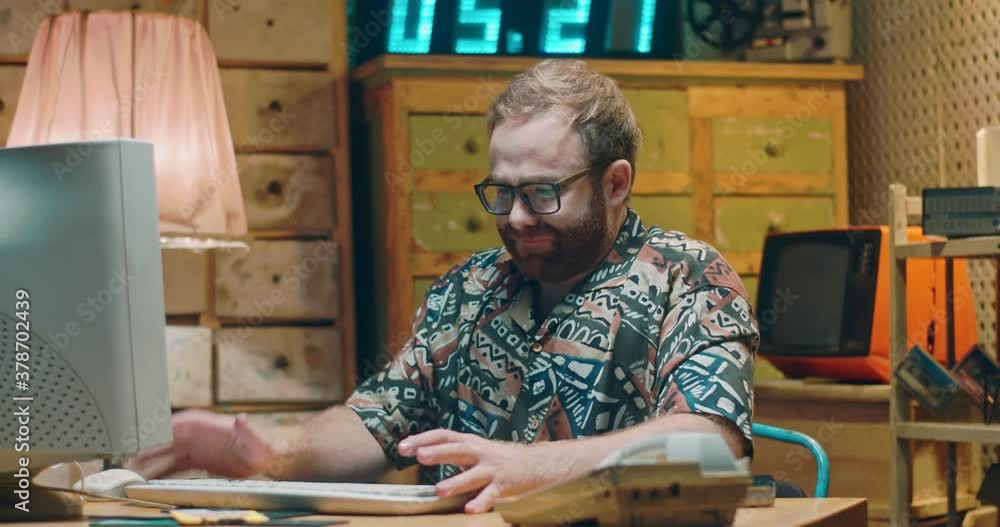 Caucasian anxious disturbed man sitting at home at PC monitor and ...