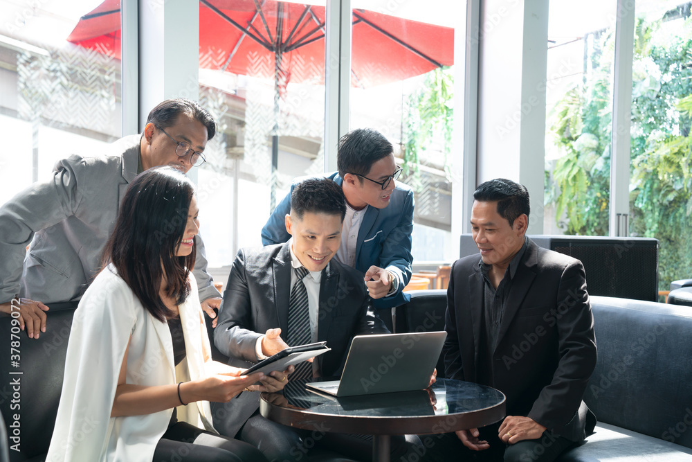 Group of successful business people cooperate discussing with his ...