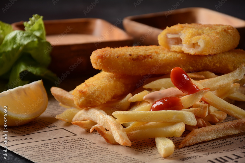 Traditional English Food - Fish and Chips. Fried fish filets and crispy ...