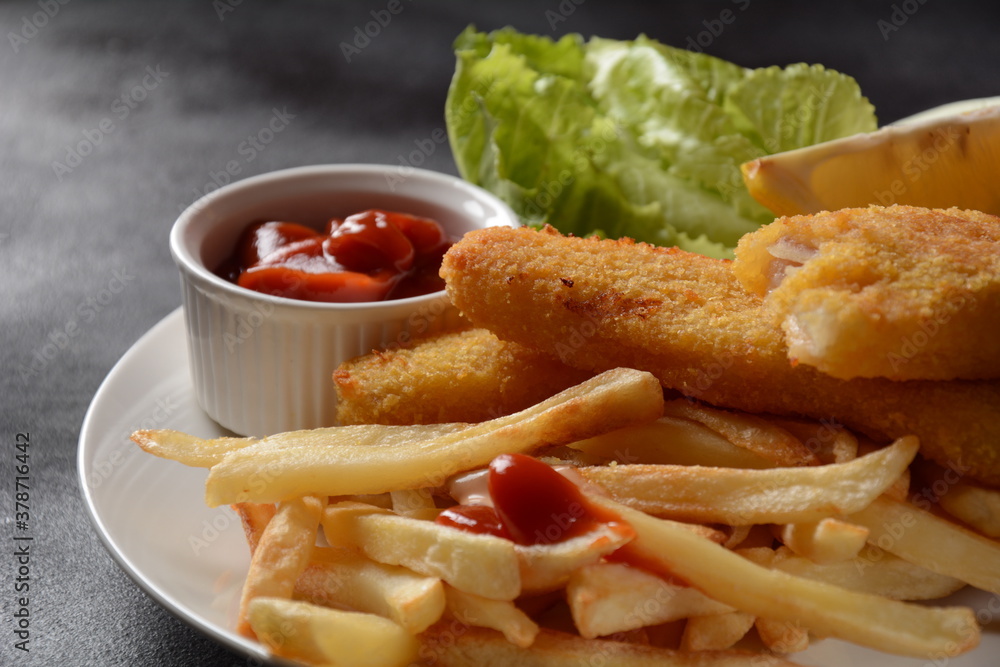 Traditional English Food - Fish and Chips. Fried fish filets and crispy ...