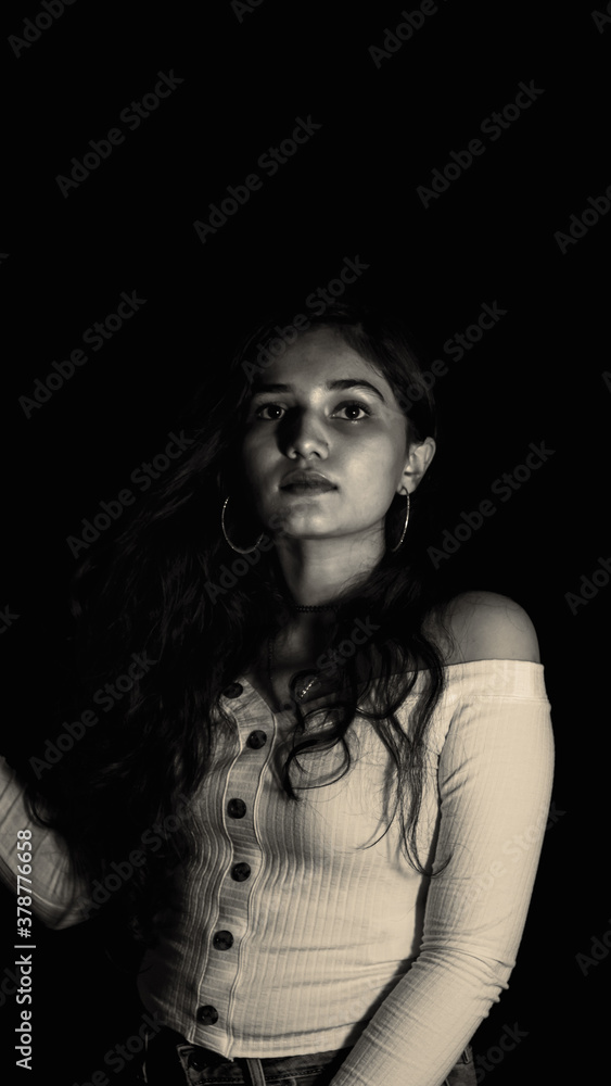 Low key portrait of Indian girl Stock Photo | Adobe Stock