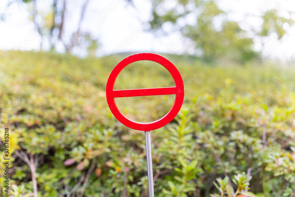 Red no-entry sign installed to protect the garden Stock Photo | Adobe Stock