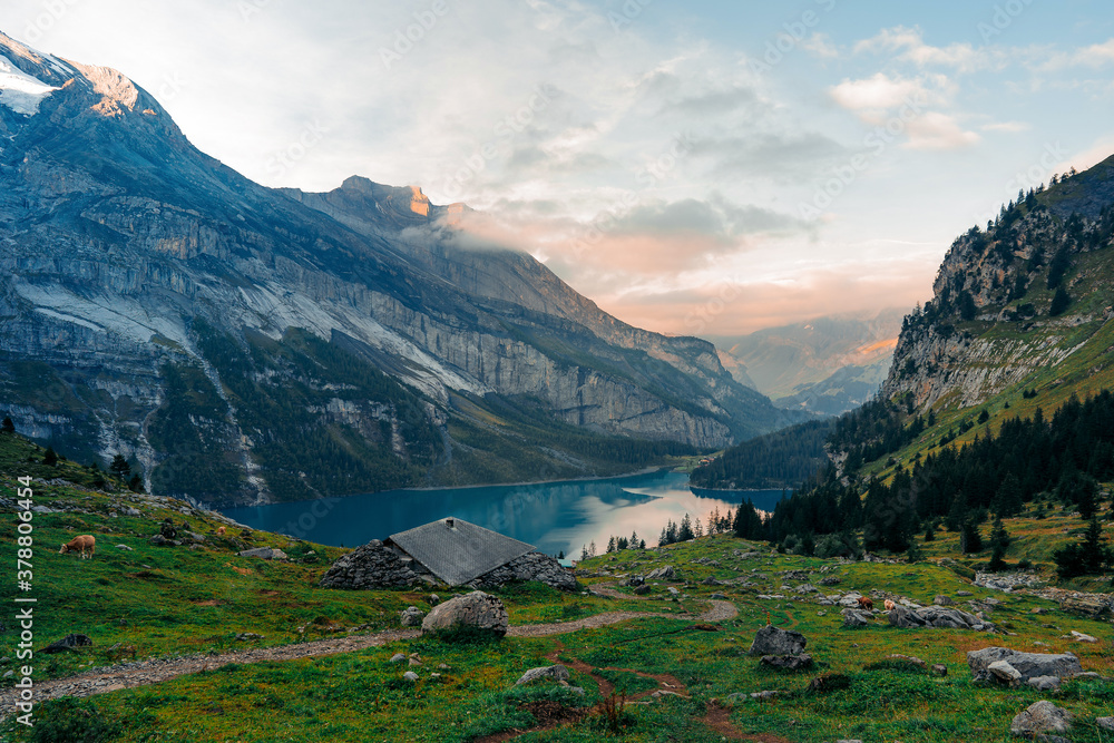Idyllic panorama view of the lake Oeschinensee. Picture or postcard ...