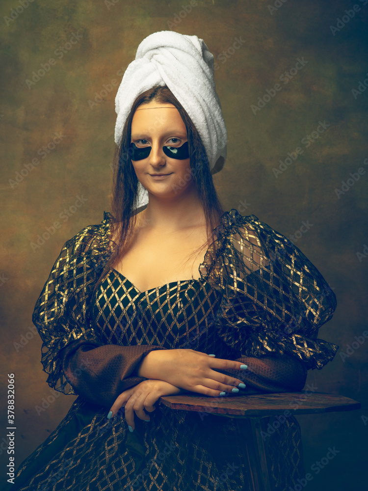 Beauty routine. Young woman as Mona Lisa, La Gioconda isolated on dark ...