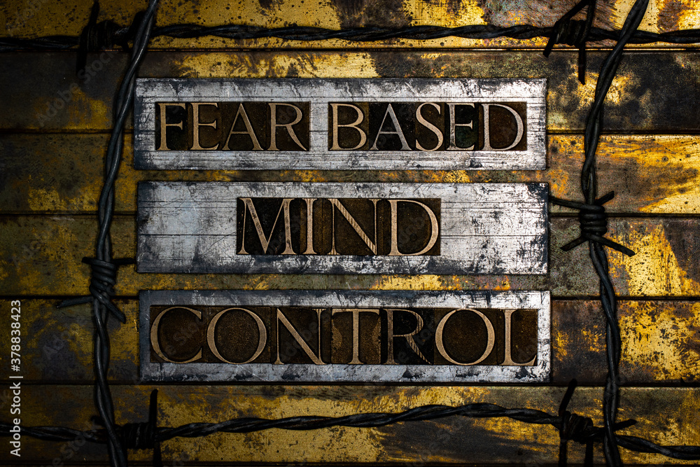 Fear Based Mind Control text formed with real authentic typeset letters ...