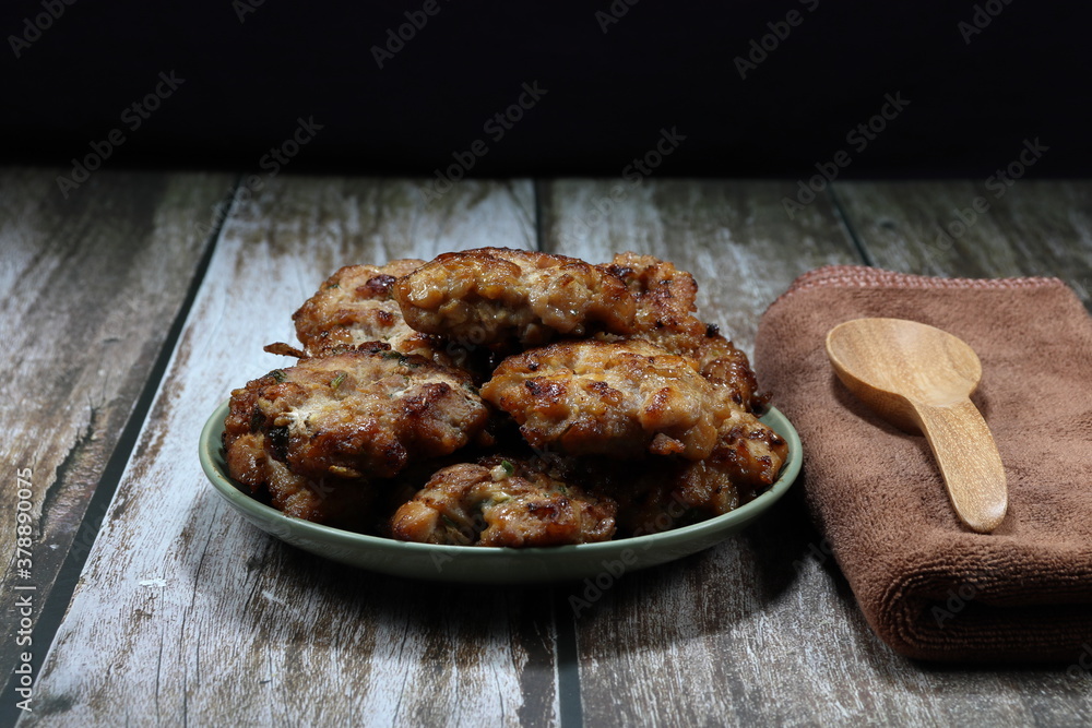 Roasted or Grilled pork meat on the plate. Famous party menu in Asia ...