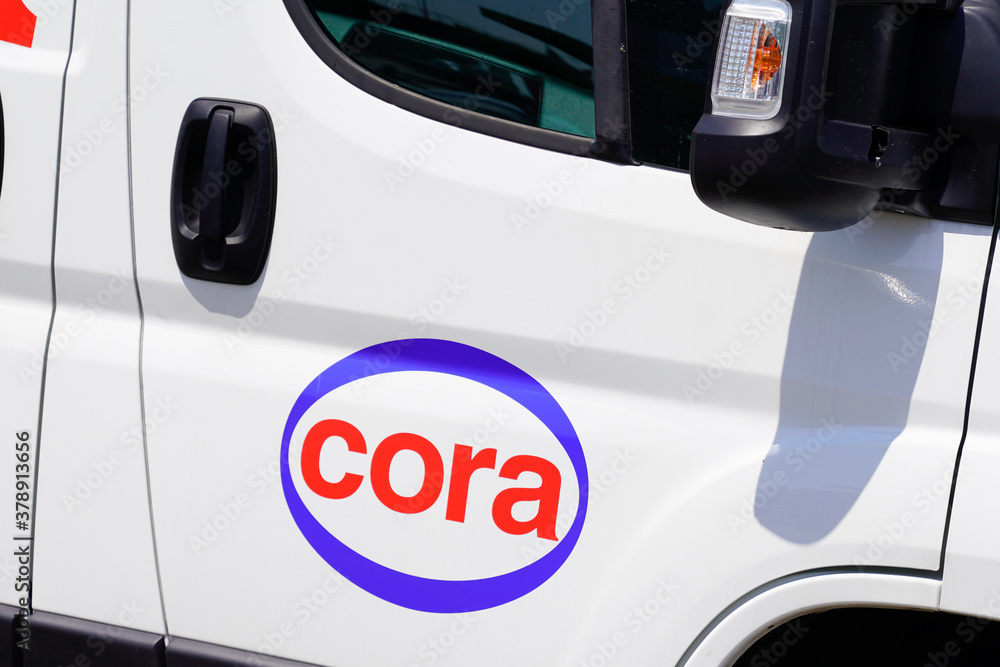 Cora hypermarket logo and text sign on delivery van of supermarket ...