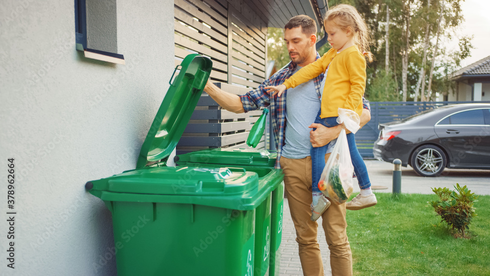 Father Holding a Young Girl and Throw Away an Empty Bottle and Food ...