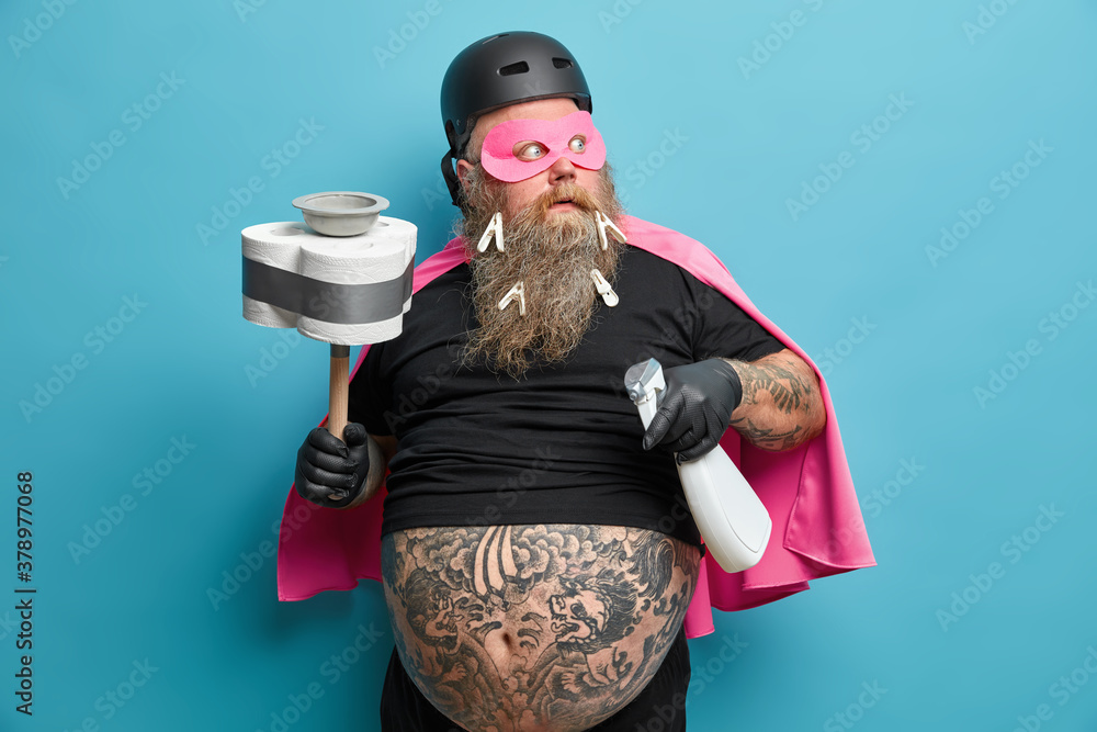 Fat cleaning man wears superhero costume holds plunger and detergent ...