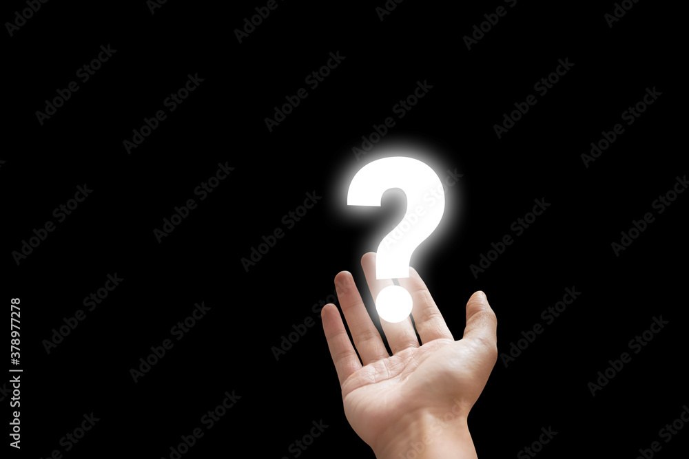 Hand holding white question mark icon symbol in black background. Stock ...