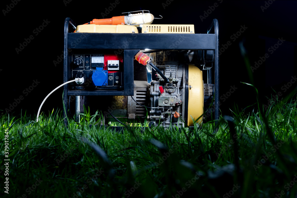 street lighting. night. The generator is yellow. Generates electricity ...