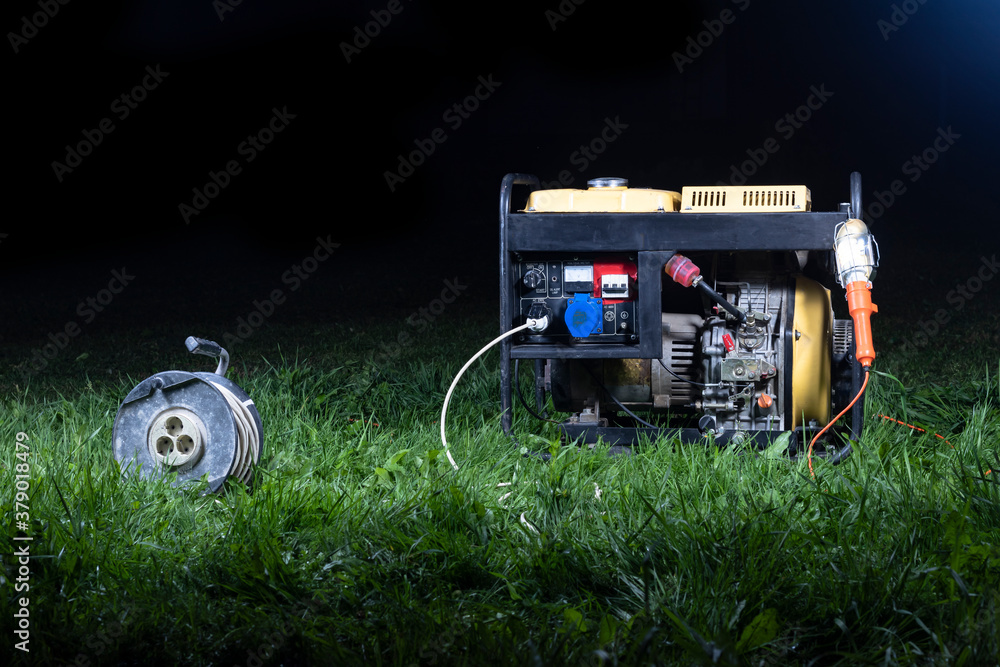 street lighting. night. The generator is yellow. Generates electricity ...