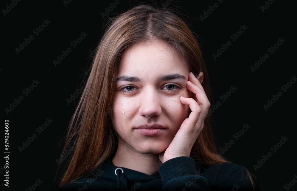 Portrait about a teenage girl crying.Dissapointed young woman has ...